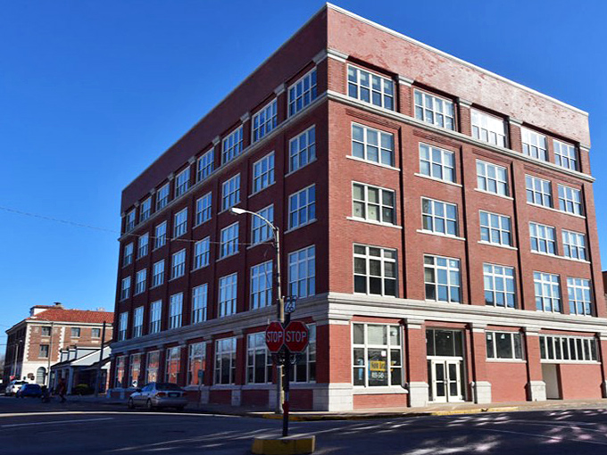 The sun sets on Miami's brick buildings, casting a golden glow on one of Oklahoma's most affordable small-town treasures.