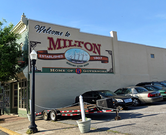 This welcoming town sign promises the kind of authentic small-town experience that makes city folks seriously consider relocating.