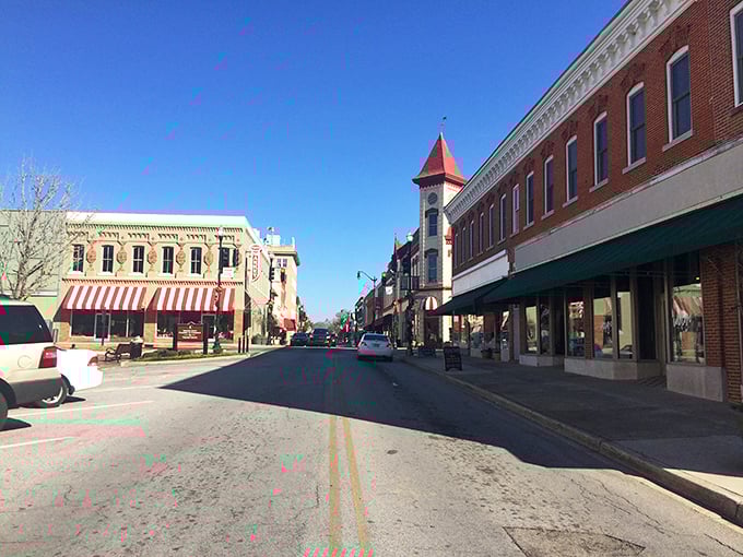 Historic Main Street buildings stand shoulder-to-shoulder, creating a downtown where your dollar stretches like taffy.