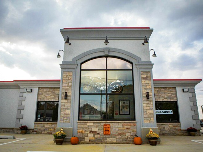 That stone facade and patriotic mural celebrate America's love affair with road food.