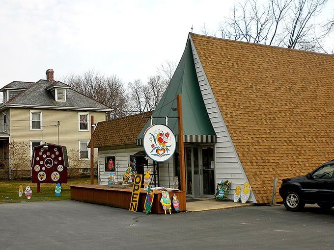 The triangular store stands inviting, its open sign welcoming visitors inside.