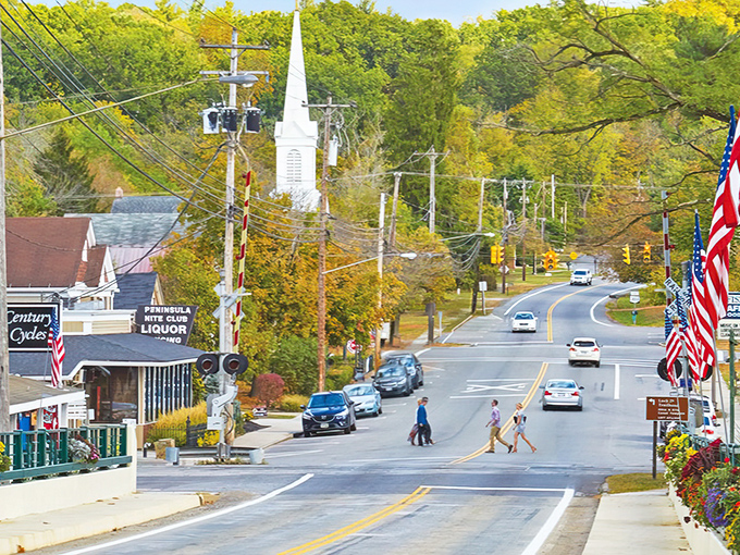 Fall colors frame Peninsula's charming streets, where every season brings a new palette to this Cuyahoga Valley gem.