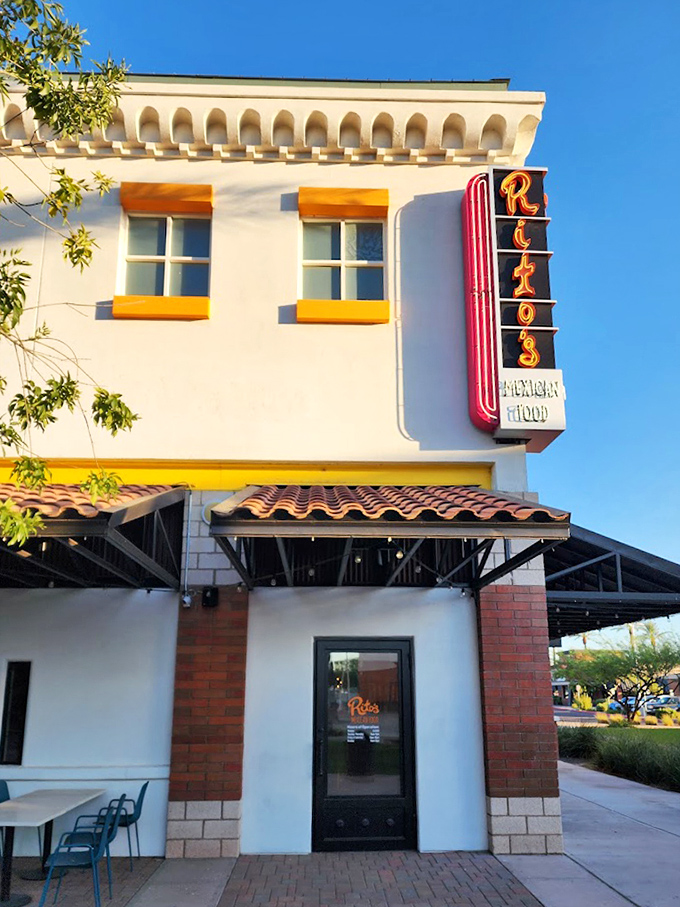 Rito's sign glows like a beacon for chimichanga enthusiasts. That neon promise of perfectly fried goodness never disappoints.
