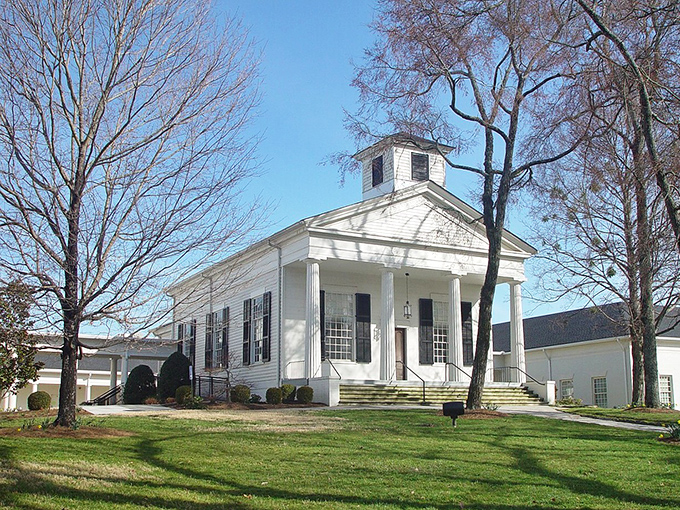 Heavenly architecture in earthly Roswell! This pristine white church stands like a Georgian time capsule, where history whispers through those classic columns.