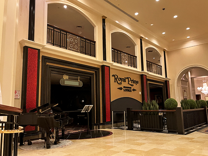A grand piano and dramatic design welcome you to Royal Prime, where fine dining meets timeless sophistication.