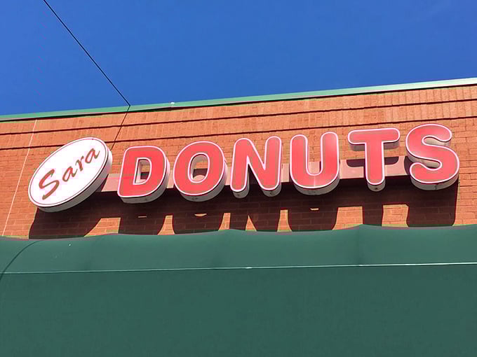 The sign says "Sara Donuts" but locals know it really means "Worth getting up early for." Some traditions are deliciously non-negotiable.