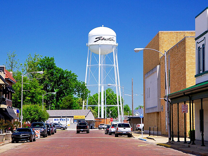 Sikeston's water tower rises like a beacon, announcing this town's presence to travelers and locals alike with pride.