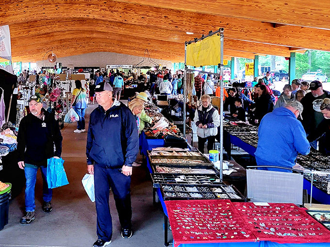 Indoor comfort meets outdoor adventure where covered pavilions protect both shoppers and their precious finds.