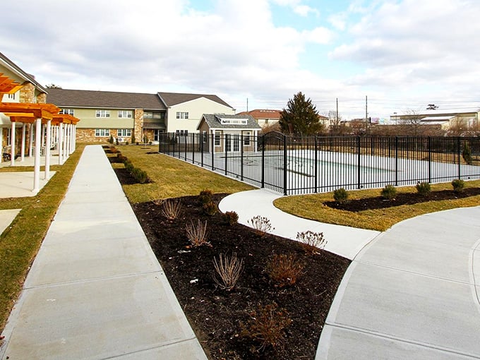 Outdoor patios become social headquarters where morning coffee turns into afternoon conversations and lifelong friendships.