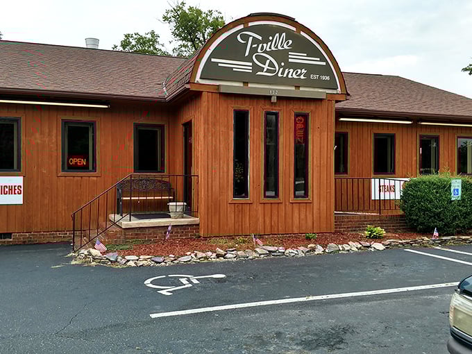 That curved entrance welcomes you like an old friend's front door - warm, inviting, and genuine.