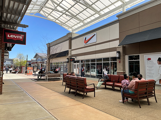 Modern shopping comfort with trees providing shade - someone actually thought about tired shoppers here.