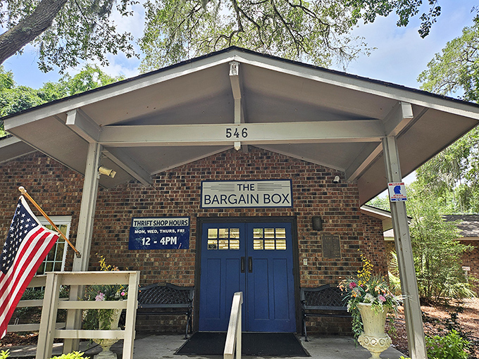 That cozy entrance with patriotic flair promises small-town charm and big-time bargains inside this island treasure.