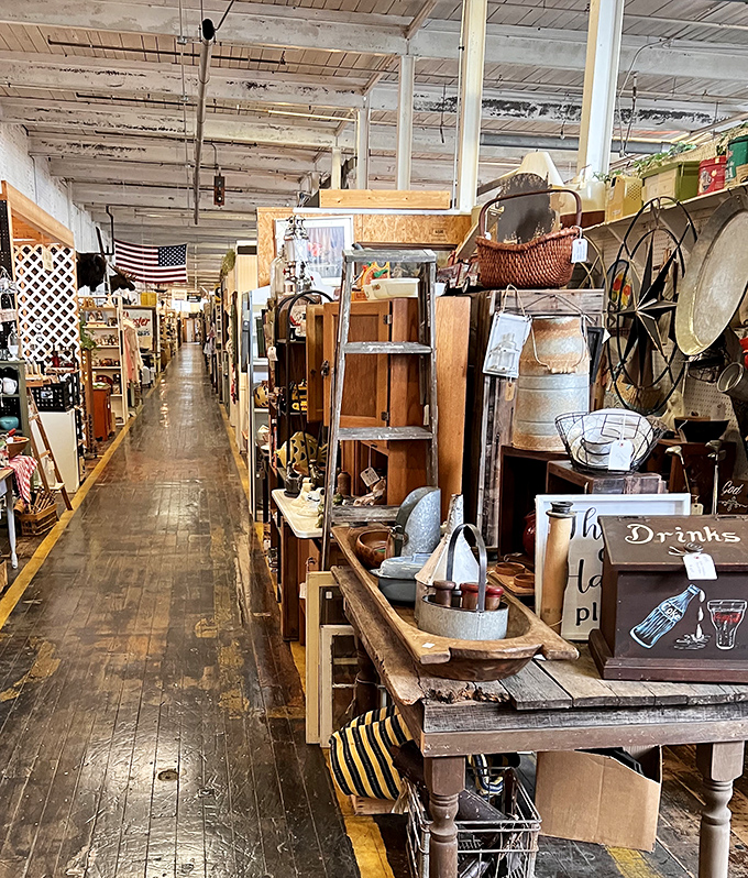 Those weathered wooden floors have witnessed decades of stories, now supporting your next great vintage discovery.