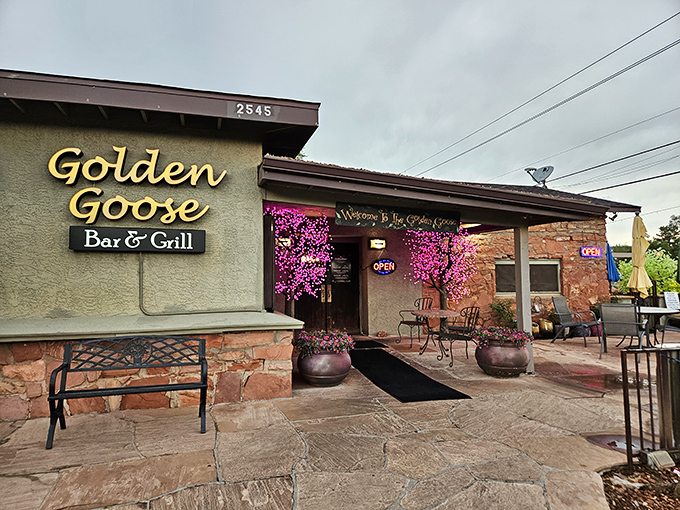 Purple blooms frame the entrance to casual dining excellence that earned serious recognition in 2025.