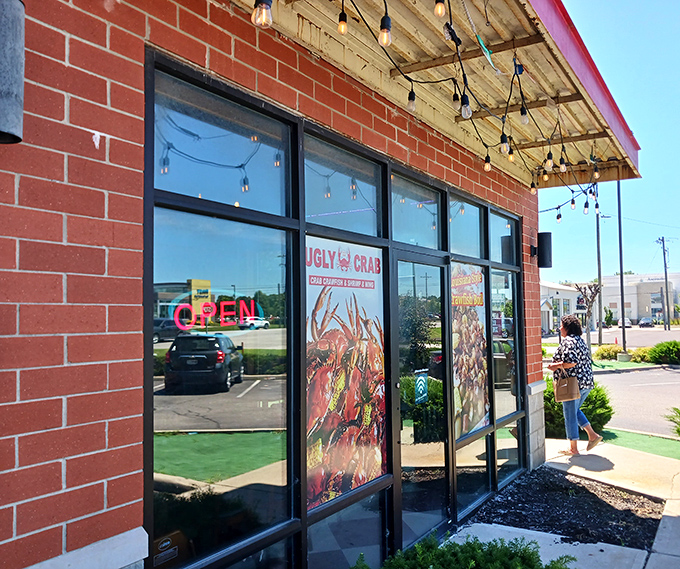 Those life-sized red crustacean sentries stand guard, protecting the seafood treasures within Ugly Crab's doors.