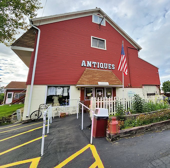 The American flag waves welcome at this charming red barn, where yesterday's treasures become tomorrow's heirlooms.