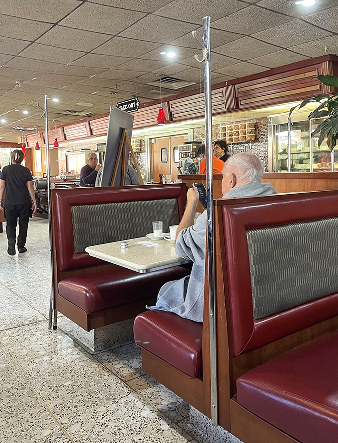 The quintessential diner experience awaits inside these windows, where strangers become friends over bottomless coffee and the waitstaff knows the regulars by name.