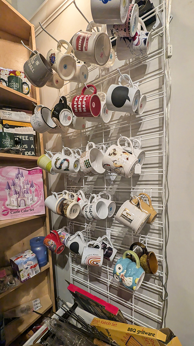 Mug collectors, shield your wallets! This caffeinated gallery features everything from corporate swag to vacation souvenirs, all hanging like caffeinated trophies.