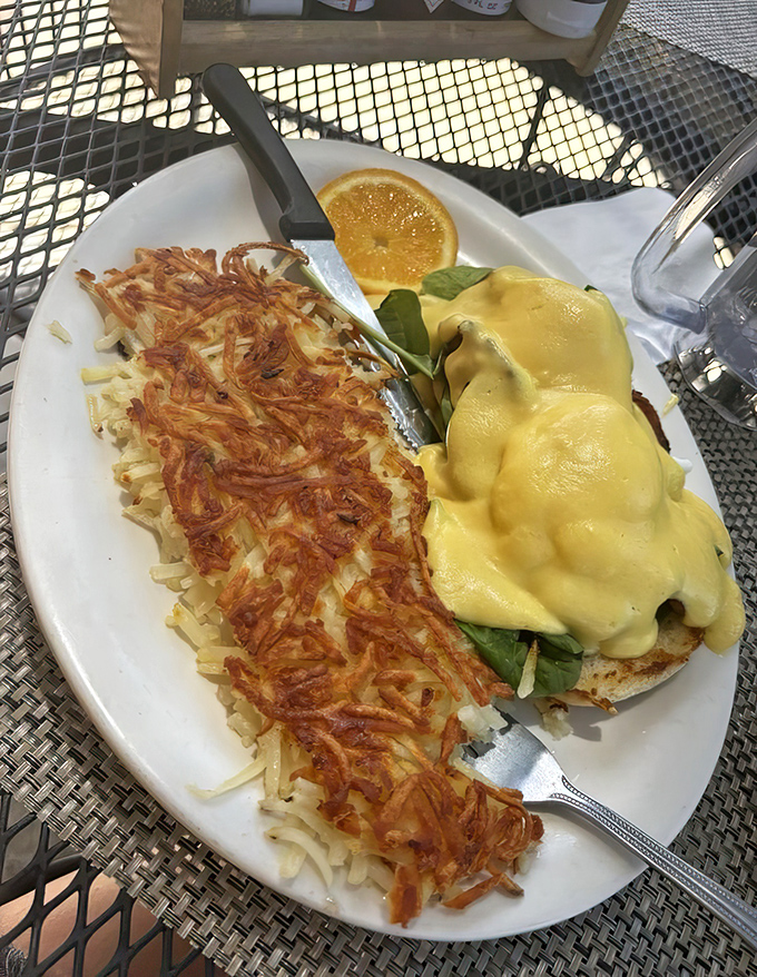 Eggs Benedict: the breakfast equivalent of wearing a tuxedo. This version, with perfectly golden hash browns, proves comfort food can still dress to impress.