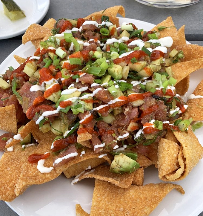These ahi tuna nachos prove that fusion food can be both sophisticated and wonderfully messy to eat together.