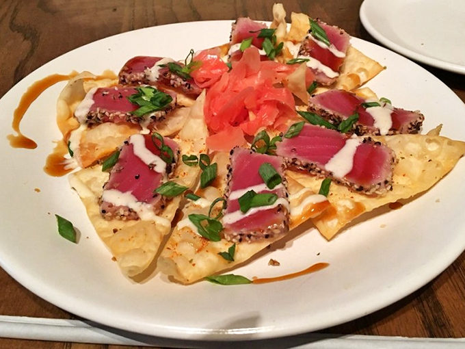 Ahi tuna nachos that make you question why you ever settled for basic cheese and chips. This is what happens when the ocean meets imagination.