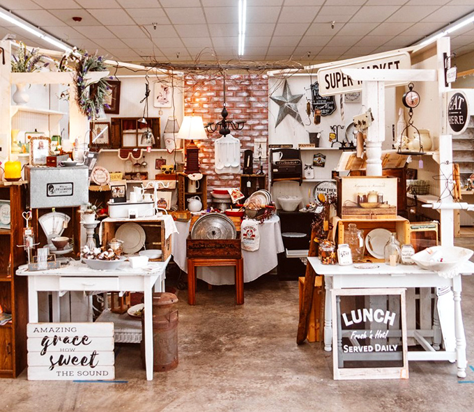 Farmhouse chic meets vintage charm in this meticulously arranged booth where even the "LUNCH SERVED DAILY" sign makes you nostalgic for meals you've never actually had.