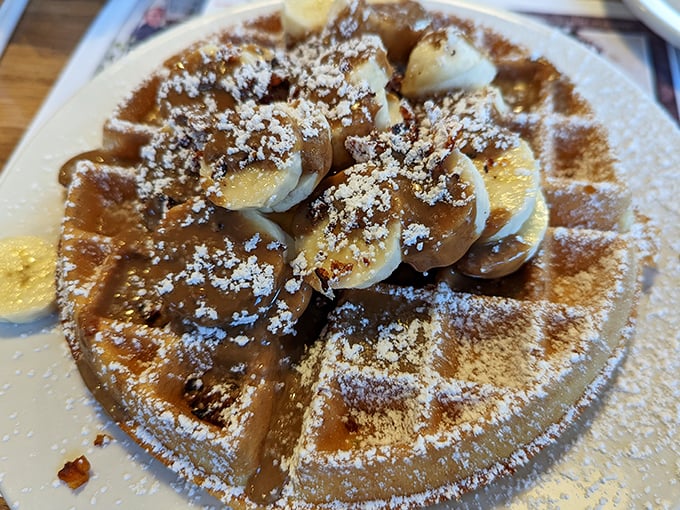 Waffle perfection isn't just about the grid marks &ndash; it's about those bananas, that dusting of cinnamon, and the way maple syrup pools in every square. 