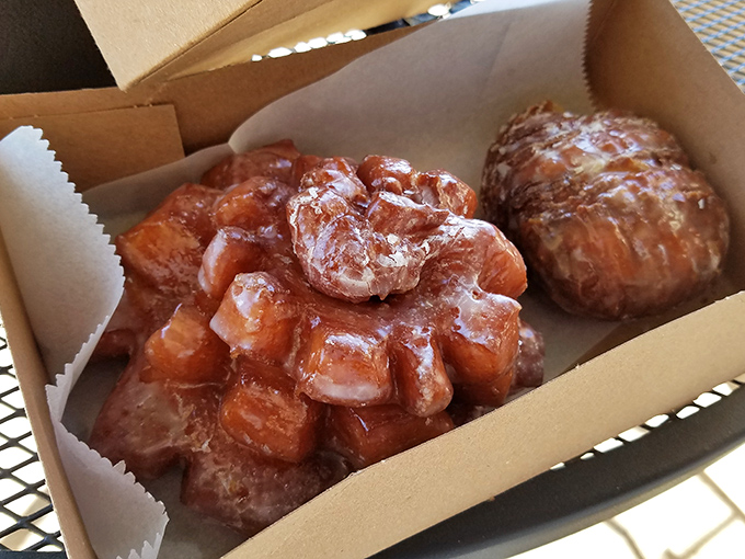 These apple fritters look like they've been kissed by autumn itself, all golden-brown and ready for their close-up.