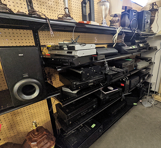 The electronics graveyard where yesterday's cutting-edge technology finds new purpose. That stereo system probably played everything from Sinatra to Springsteen in its day.