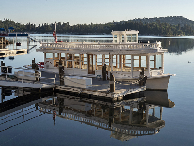 The Arrowhead Queen paddlewheel boat sits majestically at dawn. Mark Twain would approve of this Mississippi-meets-mountains vessel.