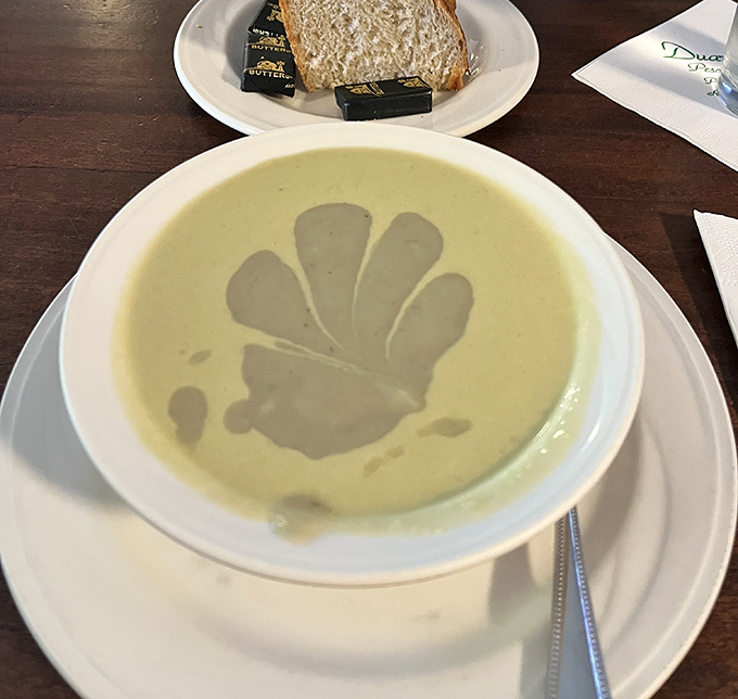 The famous artichoke soup &ndash; pale green velvet in a bowl. One spoonful and you'll understand why people drive hours just for this creamy masterpiece.