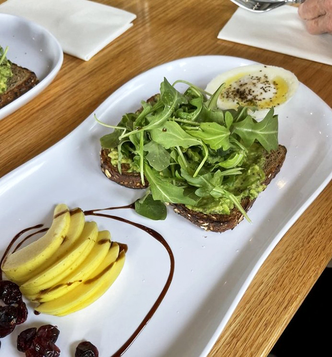Avocado toast so pretty it deserves its own portrait in a food museum somewhere.
