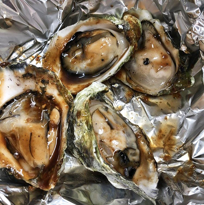 BBQ oysters&mdash;proof that smoking isn't just for land animals. Neptune himself would trade his trident for a plate of these.