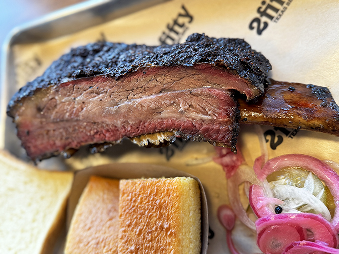 This beef rib isn't just dinner&mdash;it's Fred Flintstone's dream come true, with bark so perfect it deserves its own appreciation society.