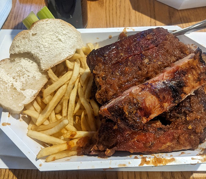 Ribs so tender they practically surrender at the sight of your fork, served with the kind of unapologetic abundance that defines Midwestern hospitality.