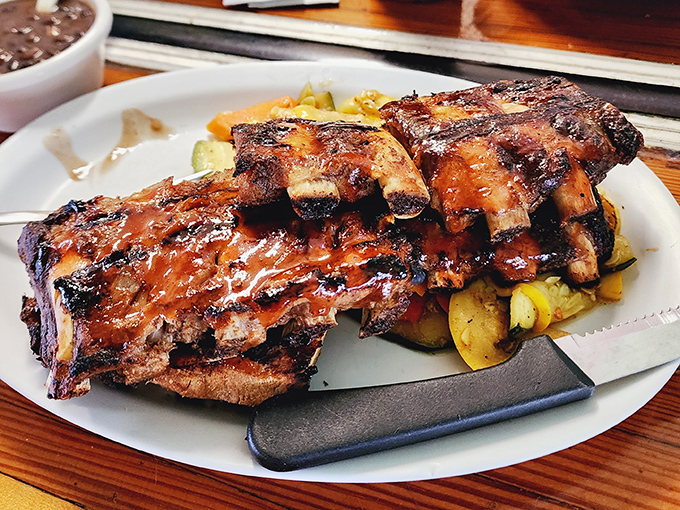 Fall-off-the-bone ribs that make you forget table manners exist. Napkins required, judgment prohibited.