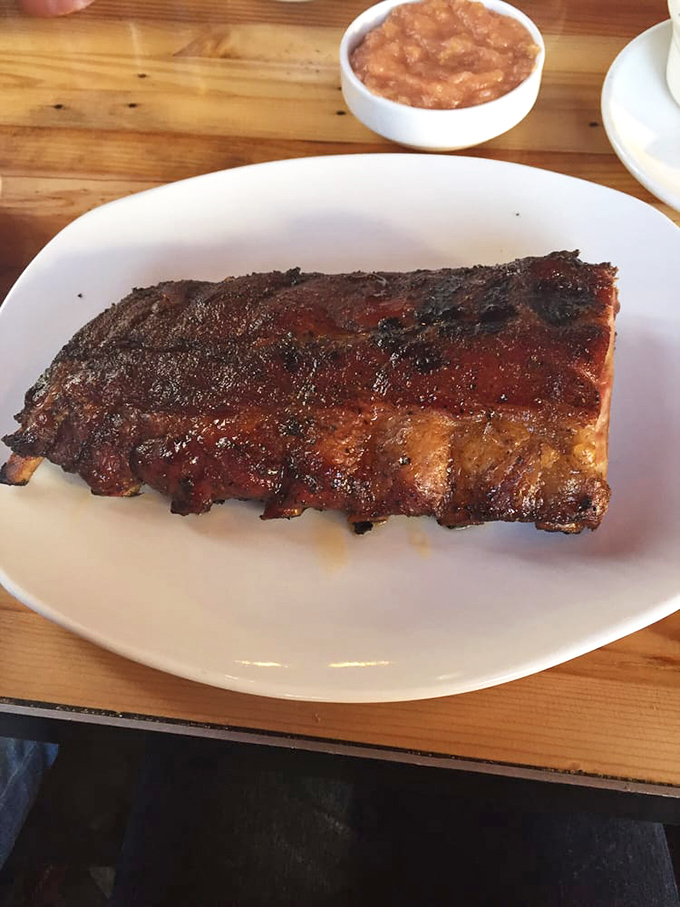 Baby back ribs with that perfect bark—the kind that makes you temporarily forget table manners exist in polite society.