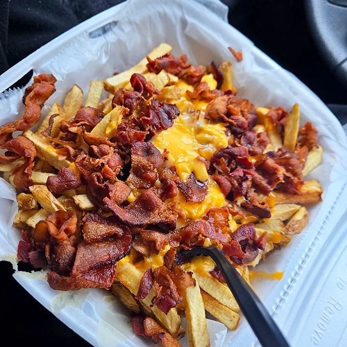 Bacon cheese fries that could make a cardiologist weep&mdash;and the rest of us cheer. Worth every delicious, indulgent calorie.