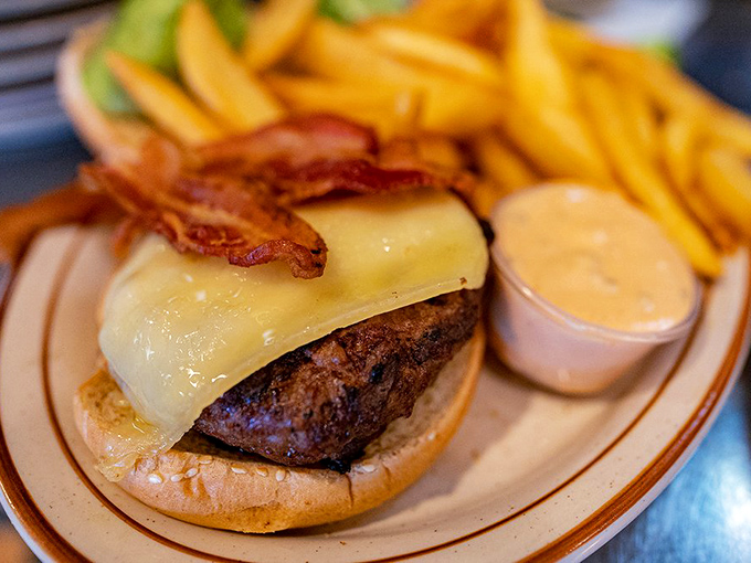 This burger isn't trying to make a statement; it already knows it's good. The cheese melt is performing at championship levels.
