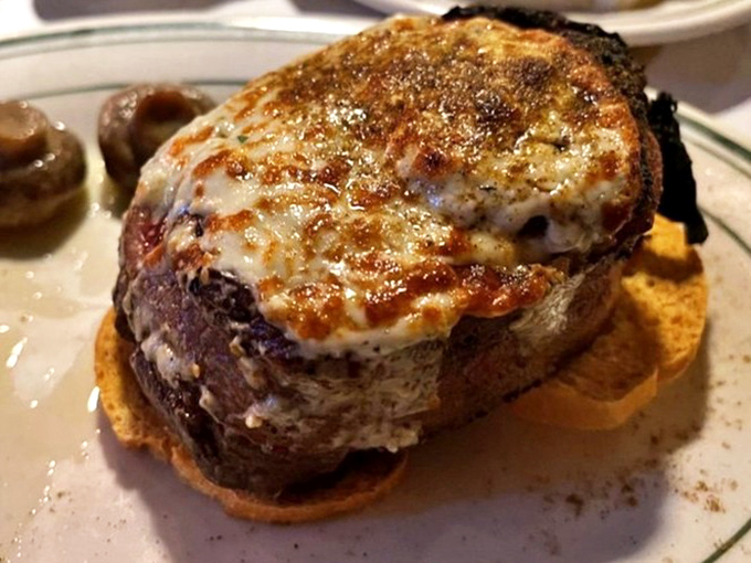 The bacon-wrapped filet topped with blue cheese is what happens when three perfect foods decide to form a supergroup on your plate.