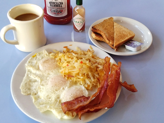 Classic bacon and eggs elevated to an art form, because some traditions never go out of style.