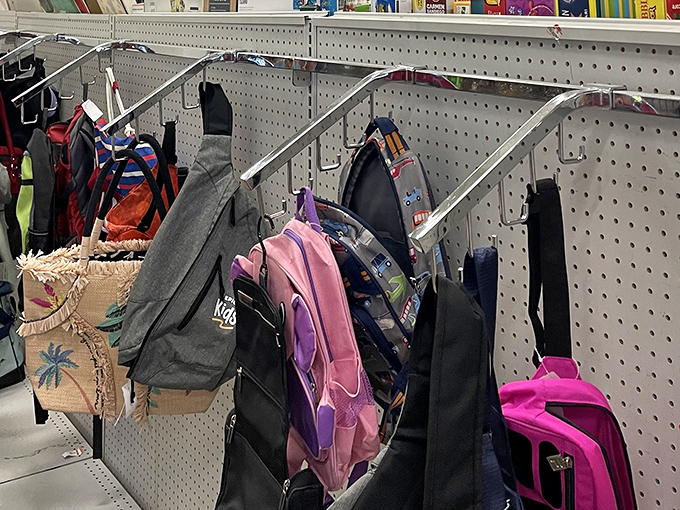 Backpack heaven for budget travelers and students alike. That pink one might have carried textbooks yesterday, but tomorrow it could summit Half Dome.