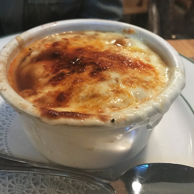 French onion soup so authentic, it practically comes with its own Parisian attitude and melted cheese beret.