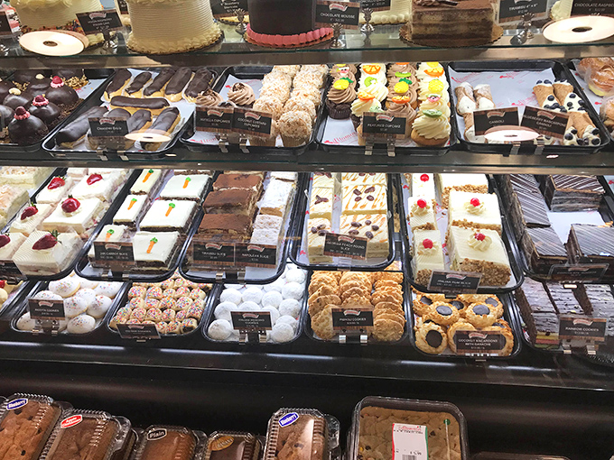 Dessert display that requires both self-control and a strategy. Like chess, but with cannoli and tiramisu as the pieces. Checkmate, diet plans.