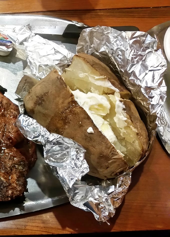 That baked potato wrapped in foil like a precious gift comes loaded with butter &ndash; because in Georgia, calories don't count when they're this delicious.