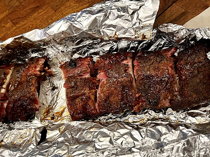 Behold the ribs&mdash;that pink smoke ring isn't just for show. It's a badge of honor earned through hours of patient smoking.