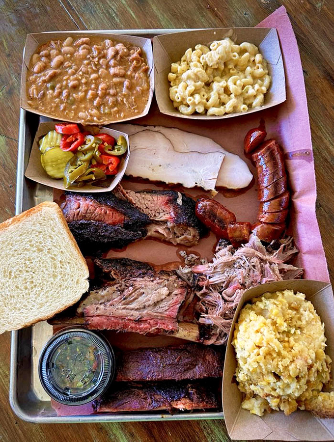 The BBQ sampler platter – where decisions are unnecessary and joy is inevitable. Note the perfect ratio of meat to sides.