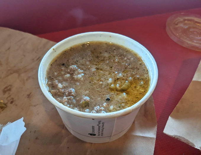 Steam rising from this hearty soup tells you everything you need to know—someone's grandmother would approve of these deeply developed flavors.