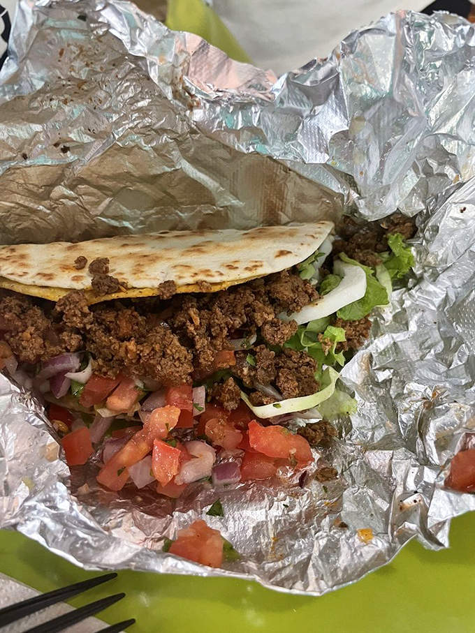 Ground beef tacos: the comfort food that transcends generations. That fresh pico de gallo isn't just hanging around&mdash;it's bringing the whole party together.