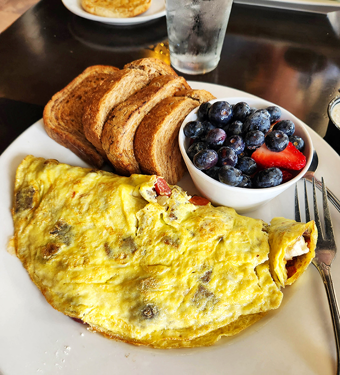 This omelet could double as a pillow &ndash; fluffy, generous, and stuffed with breakfast happiness.